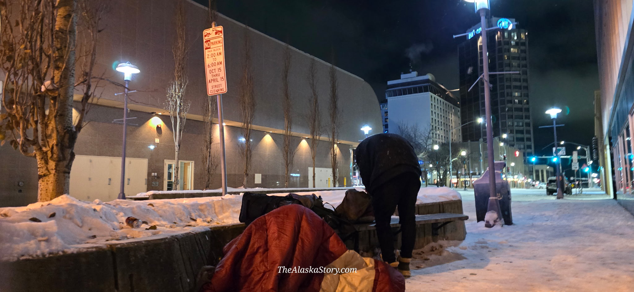 Street people camp in doorway of Anchorage Visitor Center as winter ...